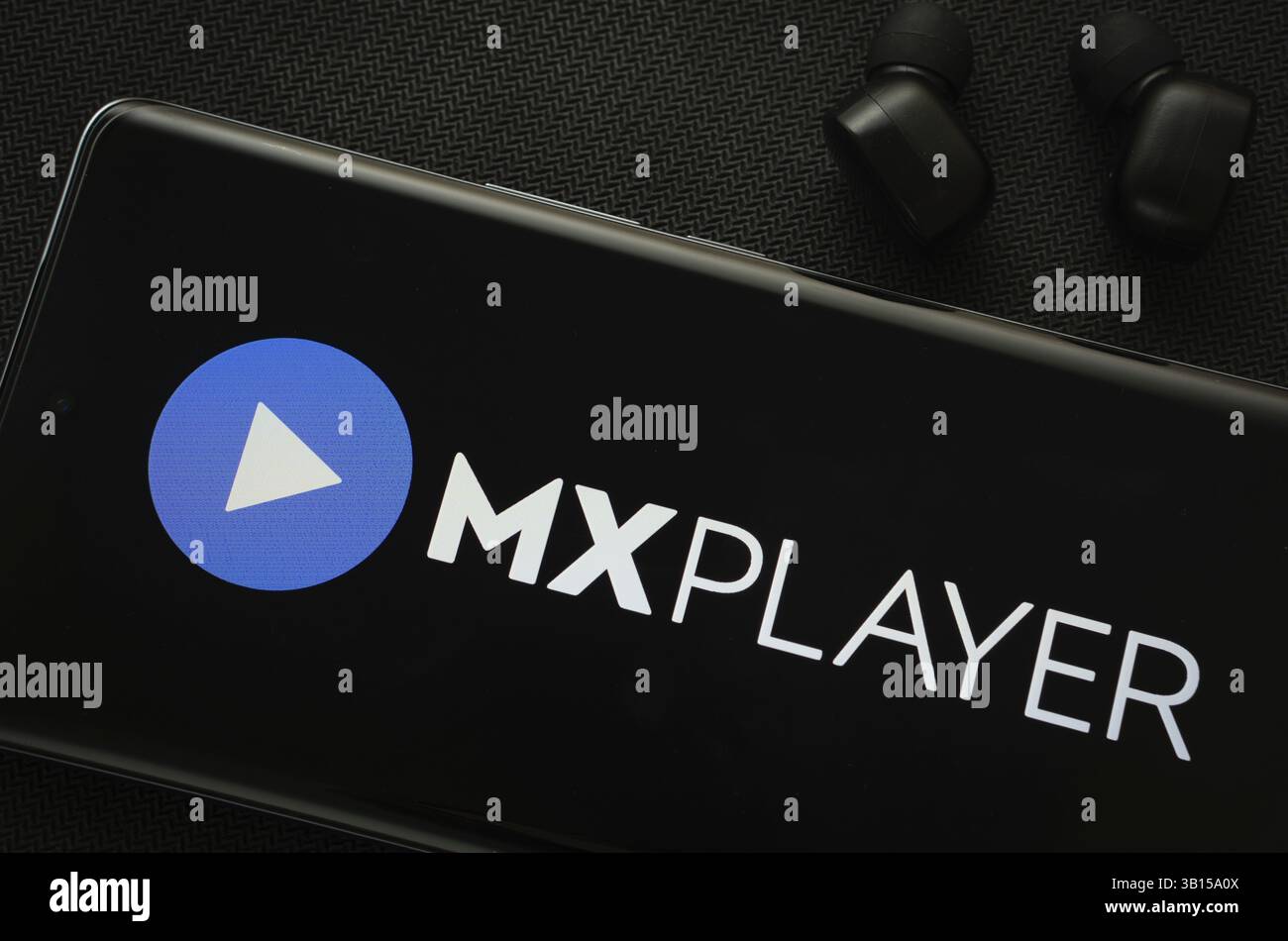 Dhaka, Bangladesh, 17 March 2025: The logo of the MX Player is displayed on a smartphone screen ...