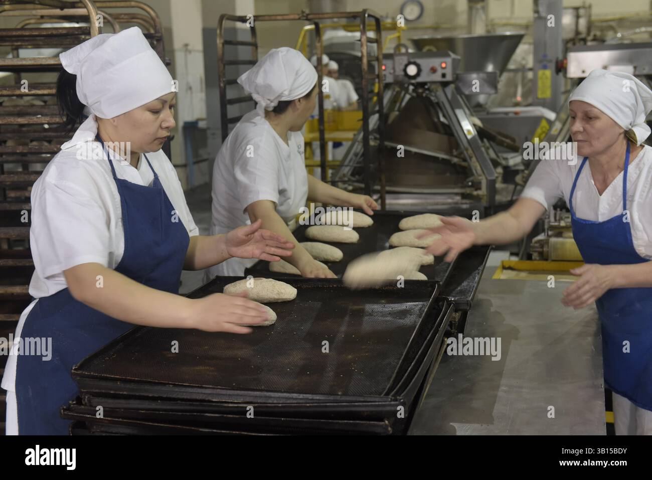 A large urban bakery. Production of bakery products and desserts Stock ...