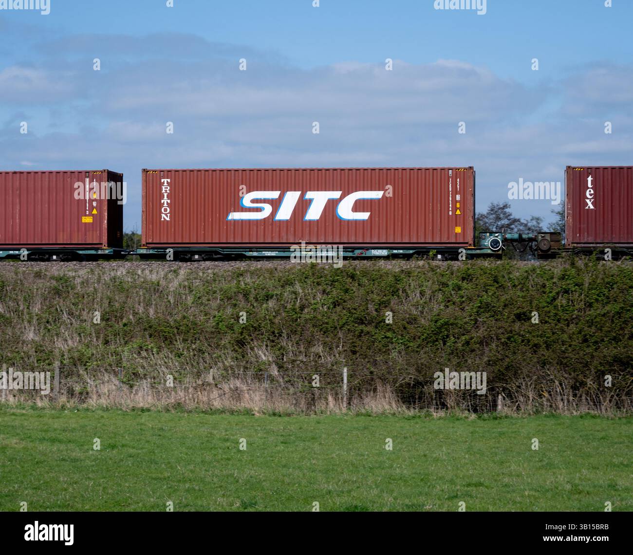 Triton SITC shipping container on a freightliner train, Warwickshire ...