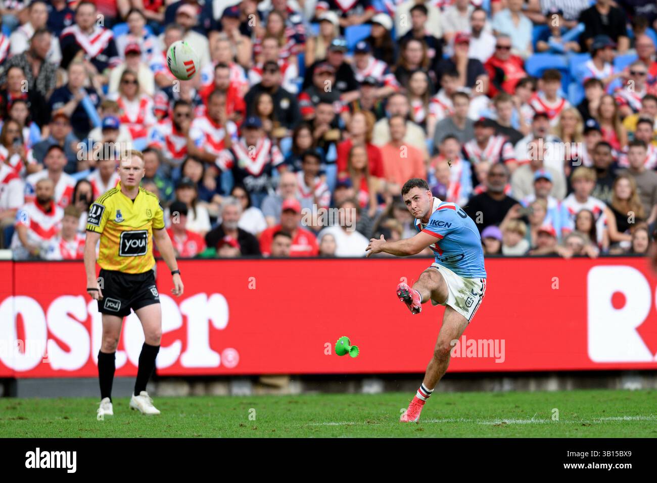 Sydney, Australia. 25th Apr, 2025. Sandon Smith of the Roosters kicks a ...