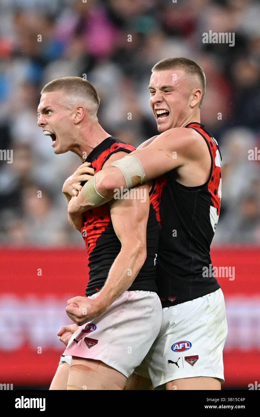 Melbourne, Australia. 25th Apr, 2025. Ben Hobbs of Essendon (left ...