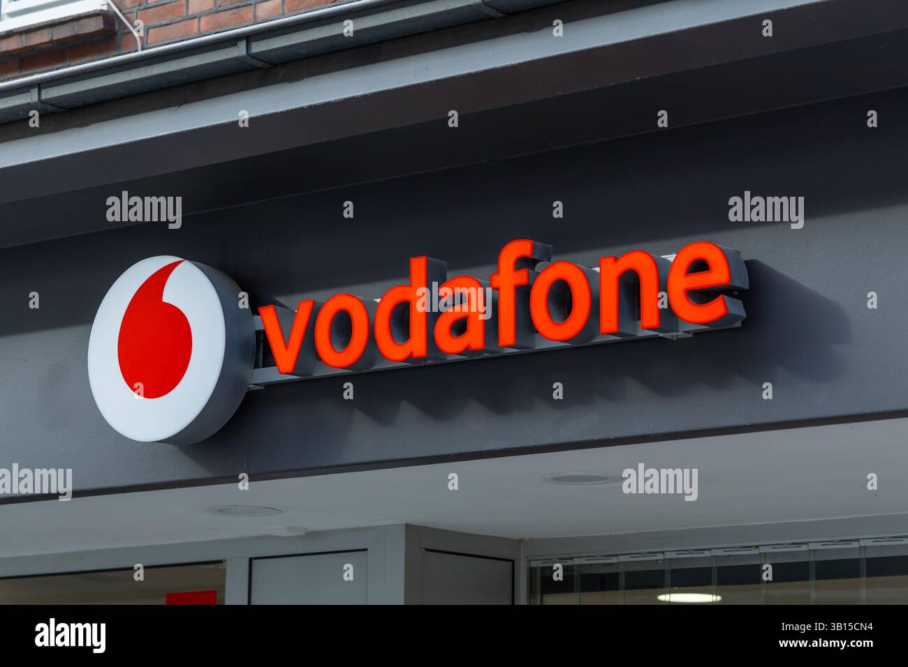 Emmerich , Germany. 19 February 2025. Red Vodafone logo at a Geman store Stock Photo - Alamy
