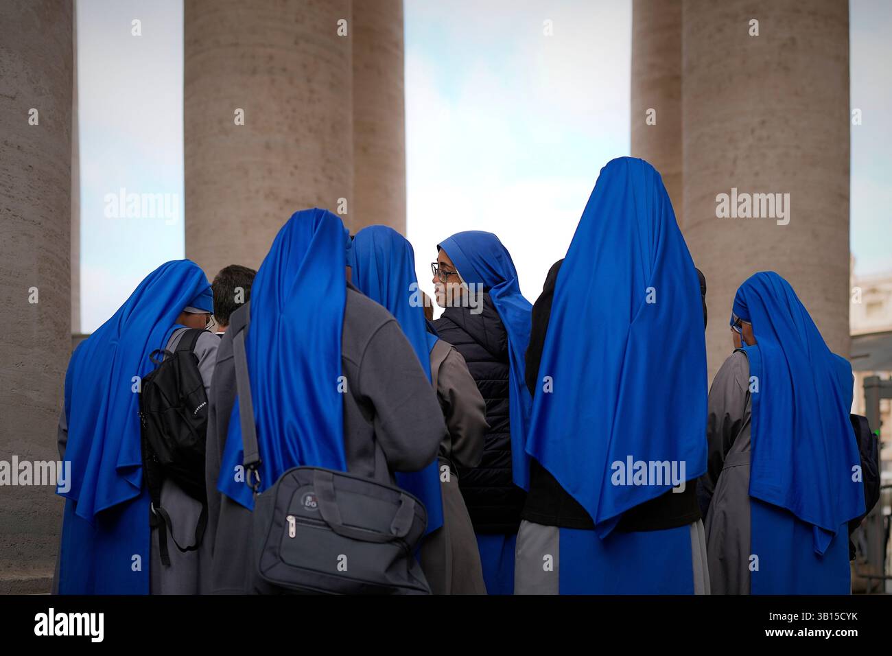 Nuns arrive in St. Peter's Square to pay their respects to the late ...