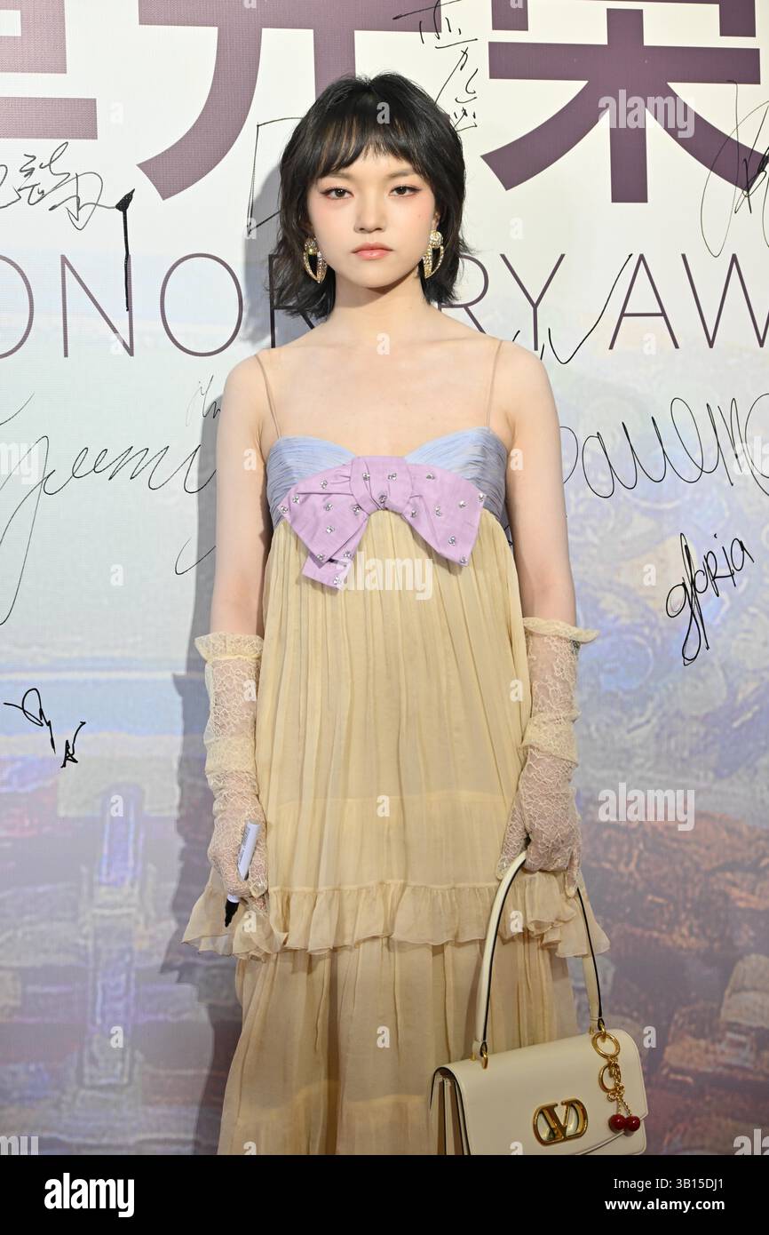 Chinese actress and singer Lan Xiya attends an activity in Beijing ...