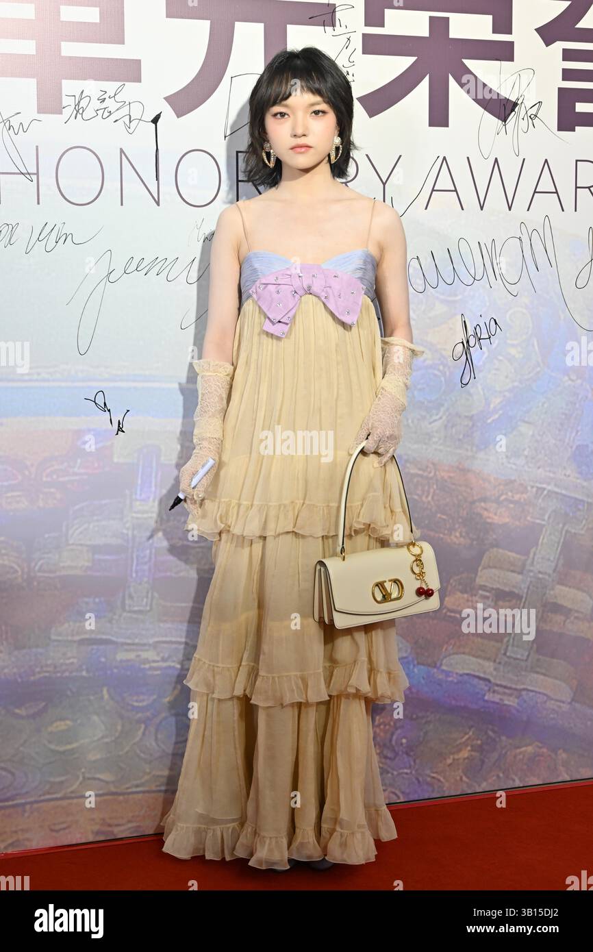 Chinese actress and singer Lan Xiya attends an activity in Beijing ...