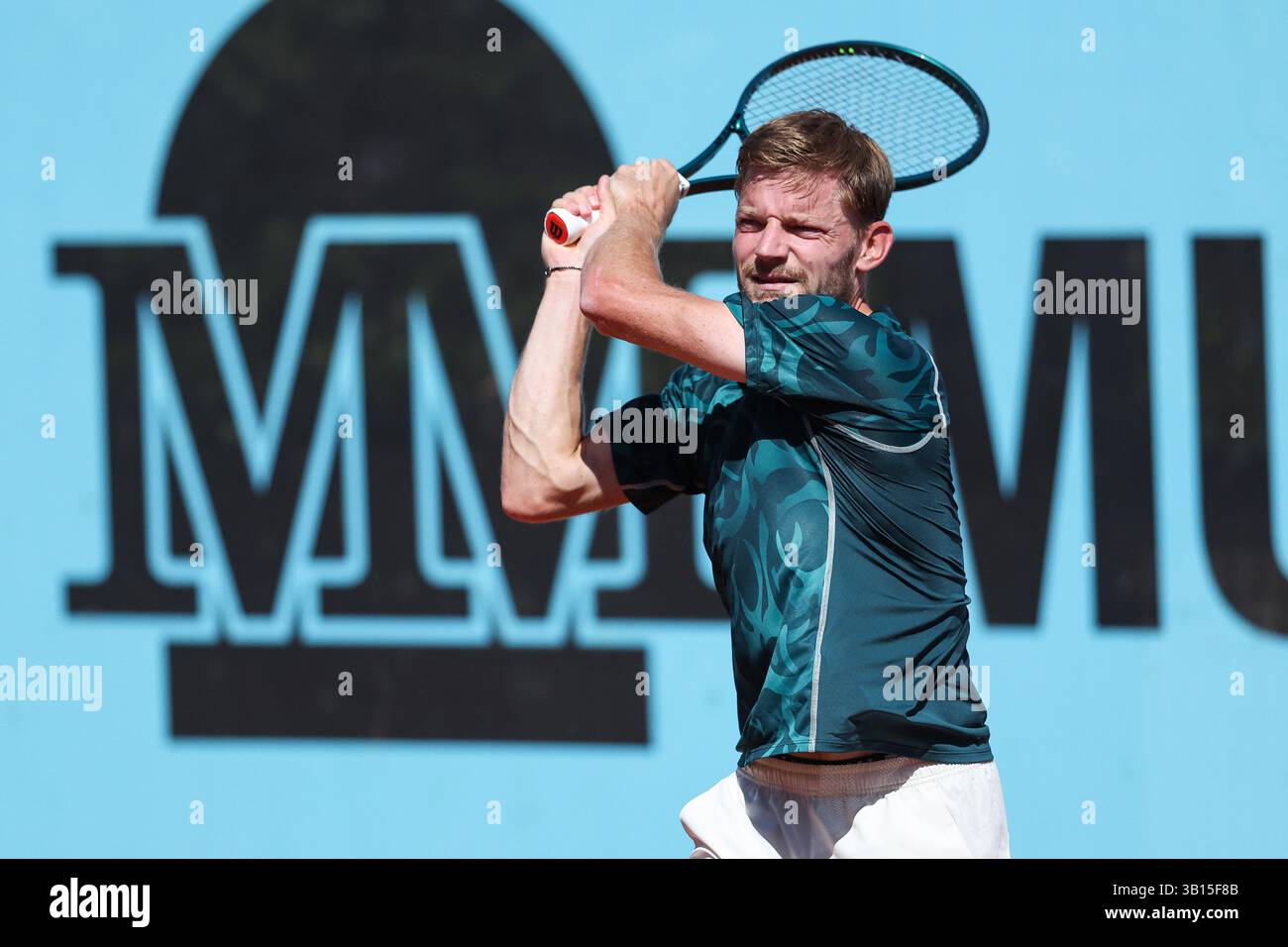 David Goffin of Belgium in action against Alexandre Muller of France ...