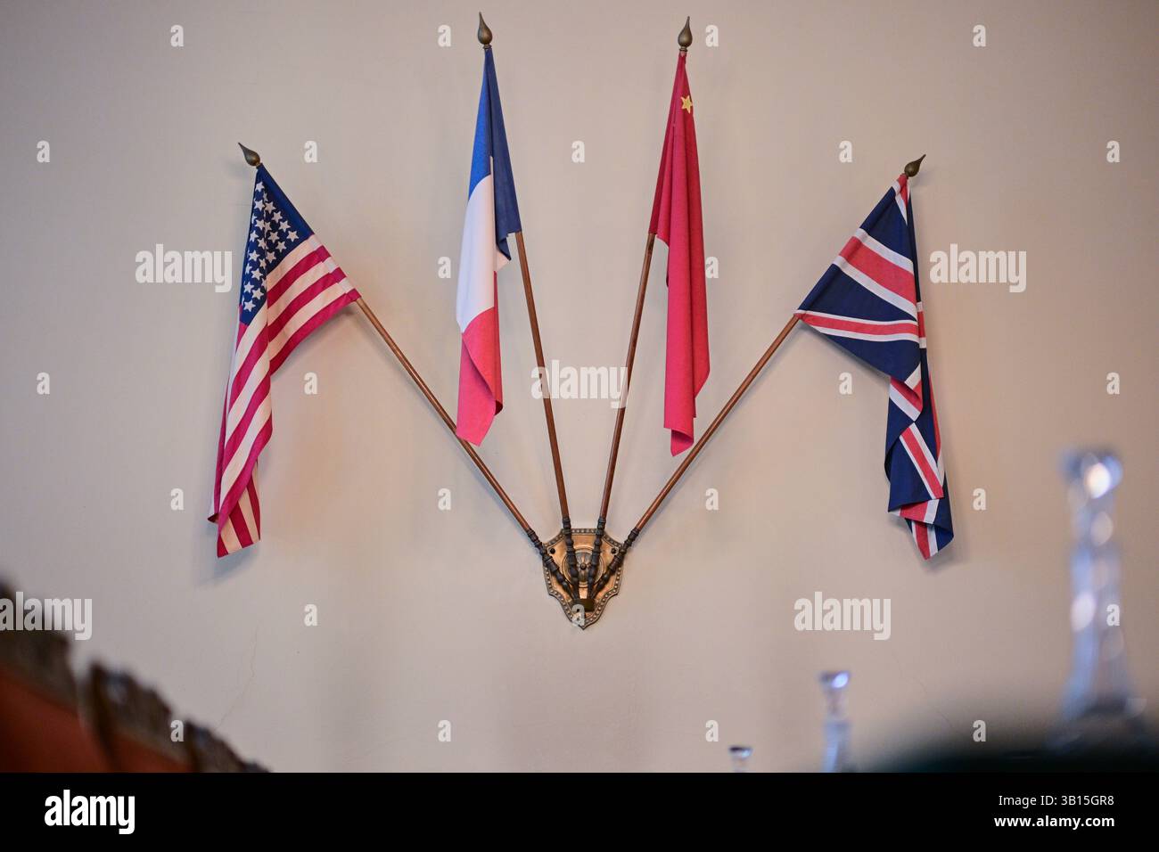 PRODUCTION - 24 April 2025, Berlin: Flags of the USA (l-r), France, the ...