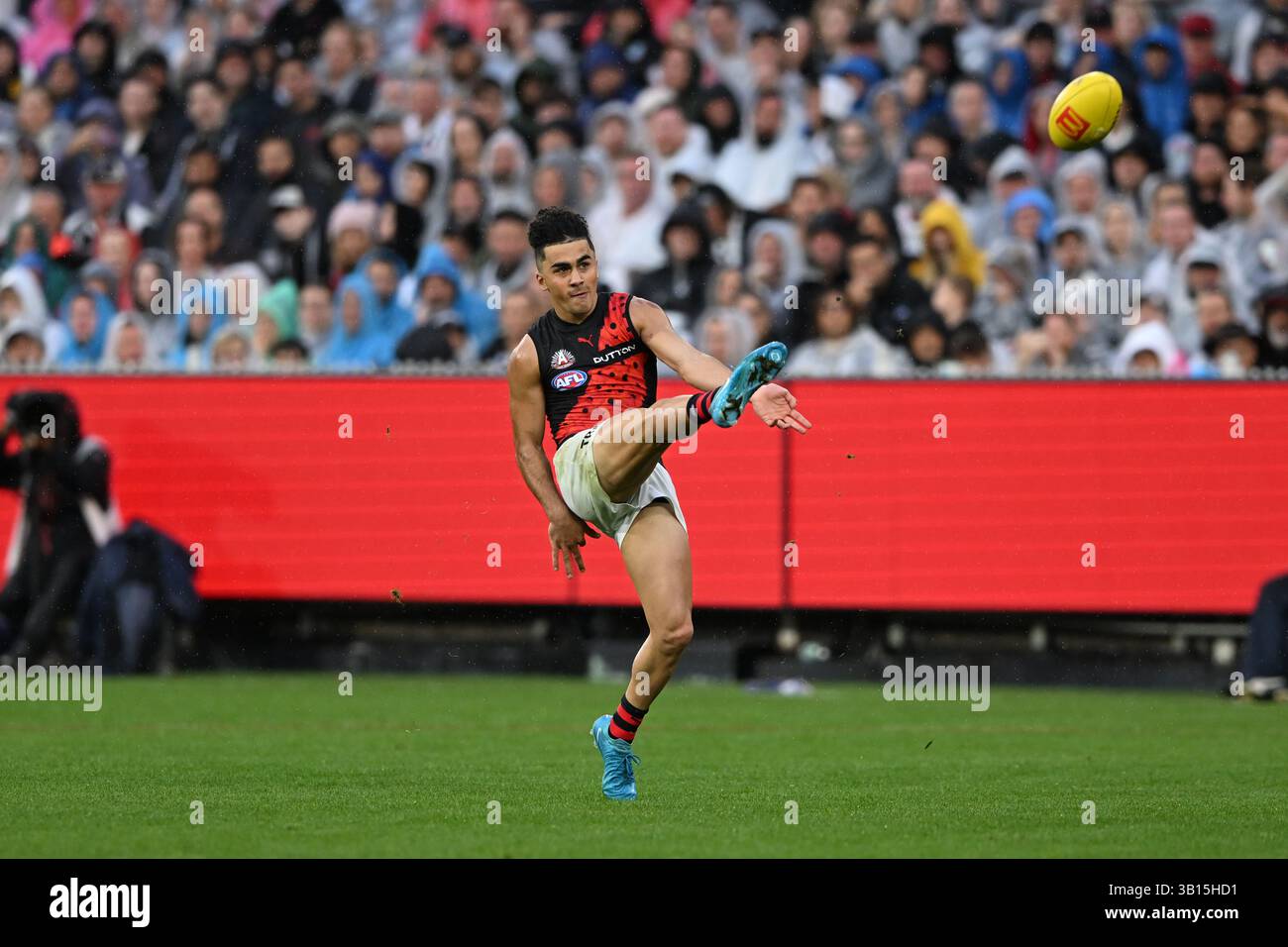 Isaac Kako of Essendon kicks the footy during the AFL Round 7 match ...