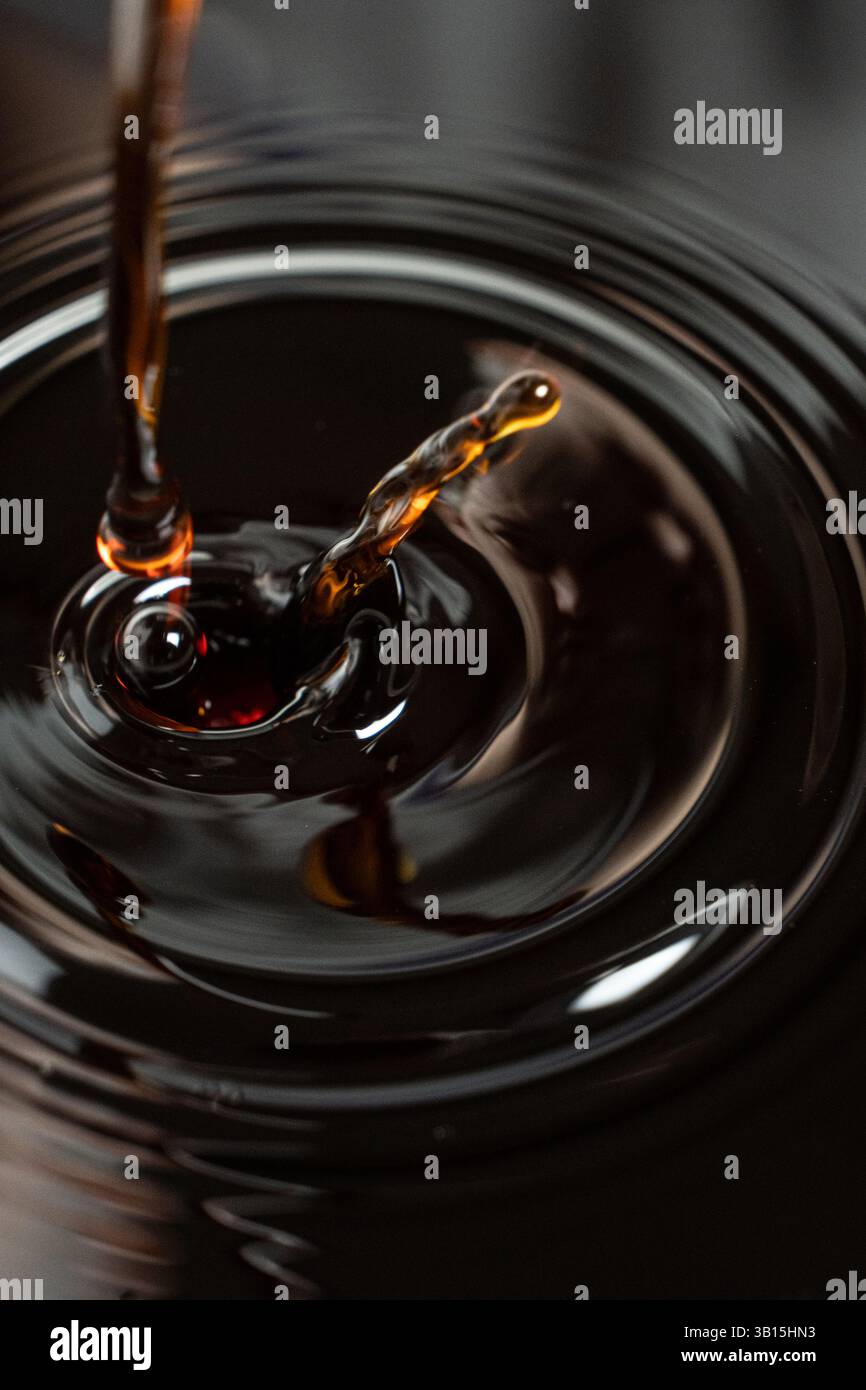 Macro soy sauce splash, flow and sprinkle Stock Photo - Alamy