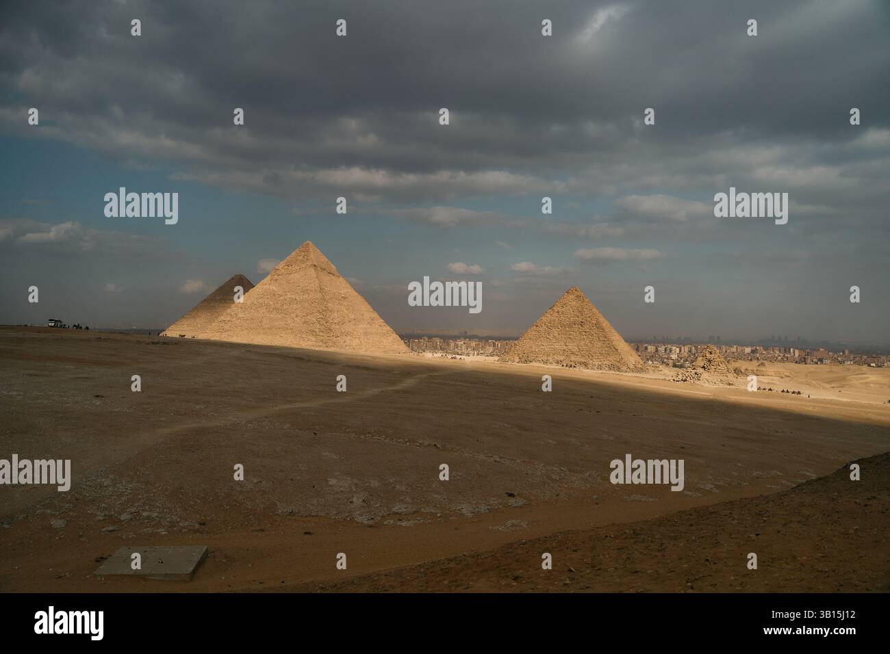 The Majestic Pyramids of Giza Stand Tall Against a Dramatic and ...