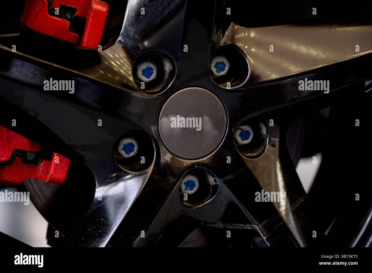 Car wheel with red brake calipers and stylish design. Red brake ...