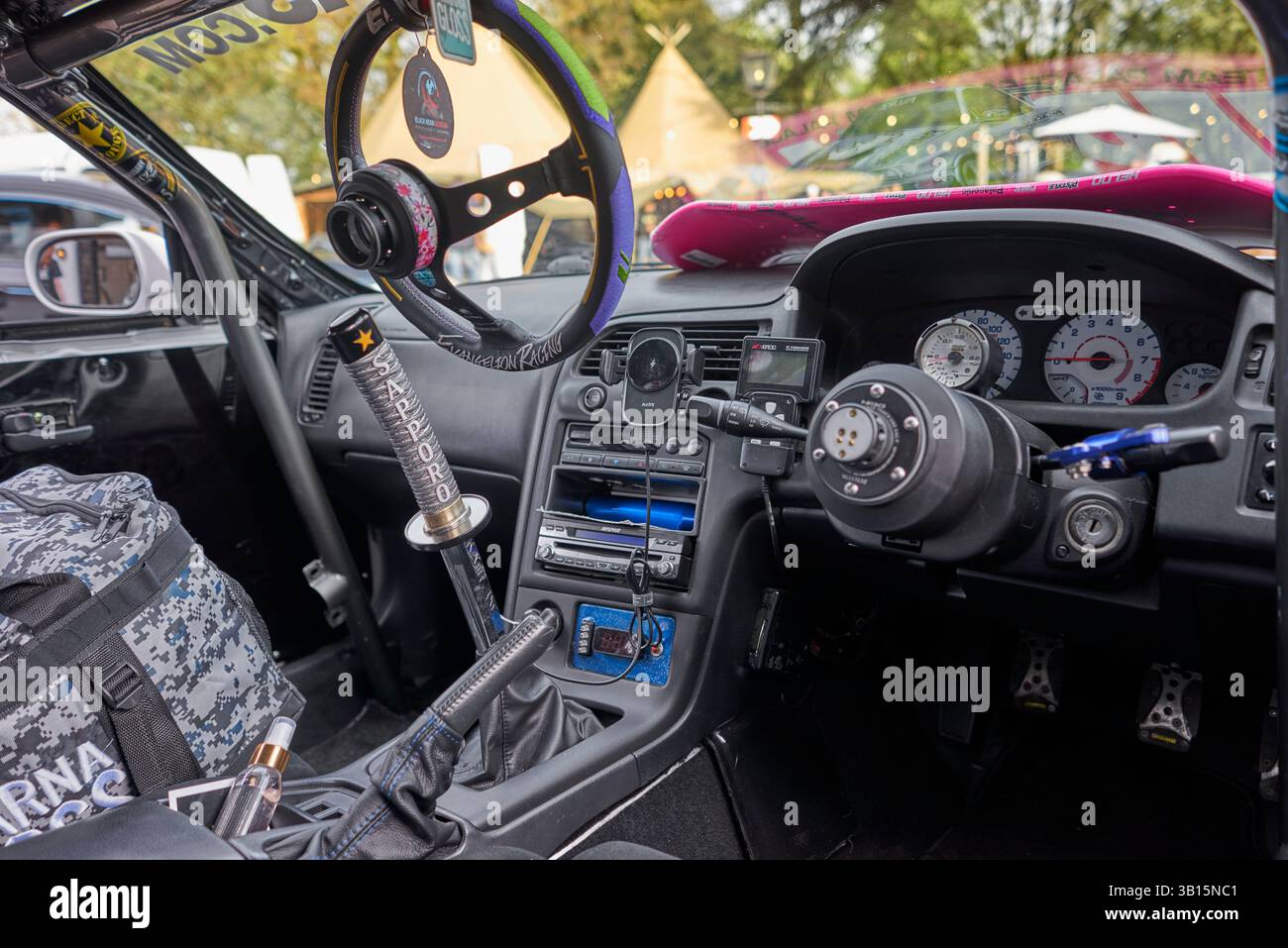 Interior cockpit of a 1995 Nissan Skyline GTS car with Samurai sword ...