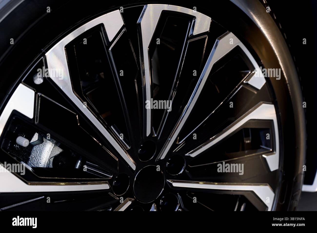 Car wheel with brake calipers and stylish design. Cast disk close up ...