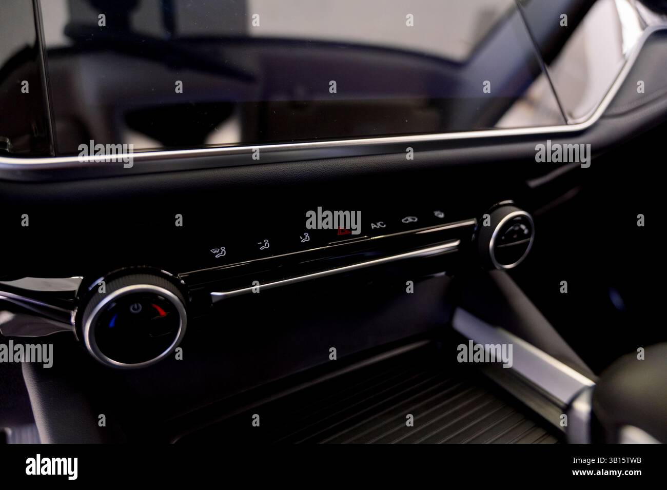 Climate control switches in a car. Temperature control buttons on a car ...