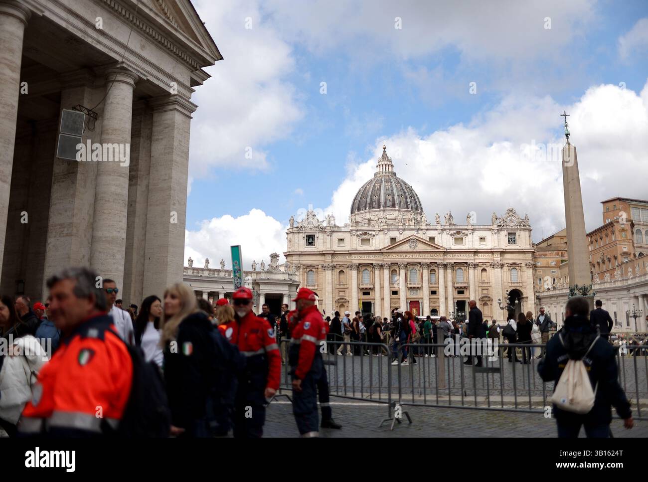 Numerous believers formed a line in St. Peter's Square to pay their ...