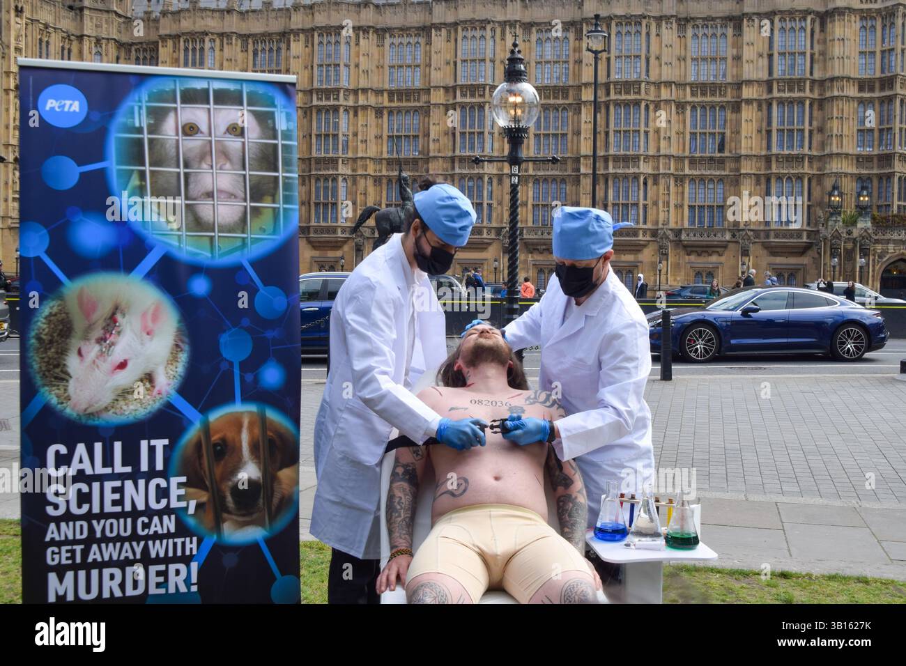 London, UK. 24th April 2025. PETA activists stage a gruesome protest ...