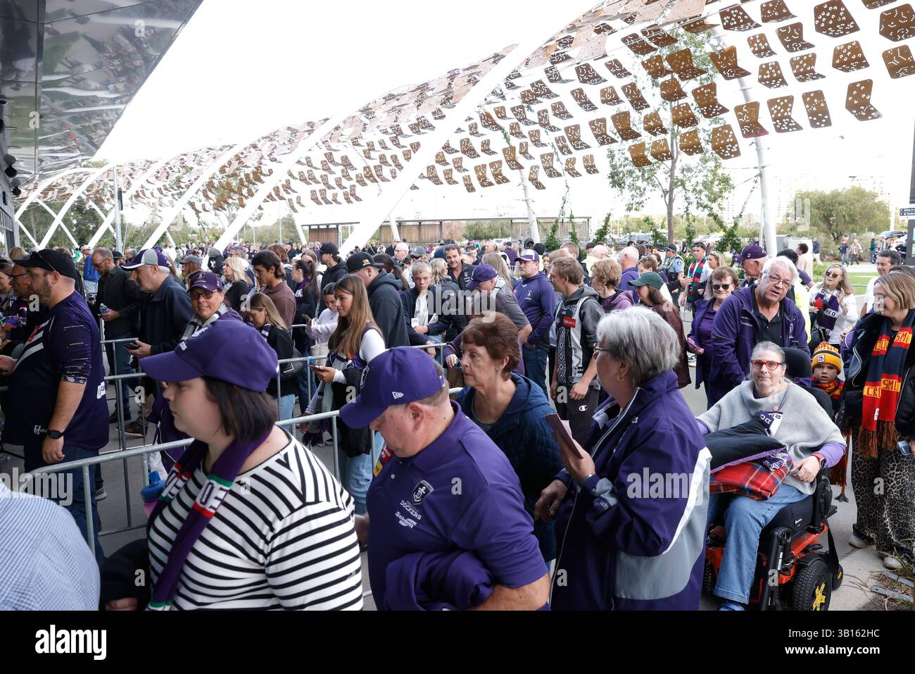 Perth, Australia. 25th Apr, 2025. Crowds enter Optus Stadium before the ...