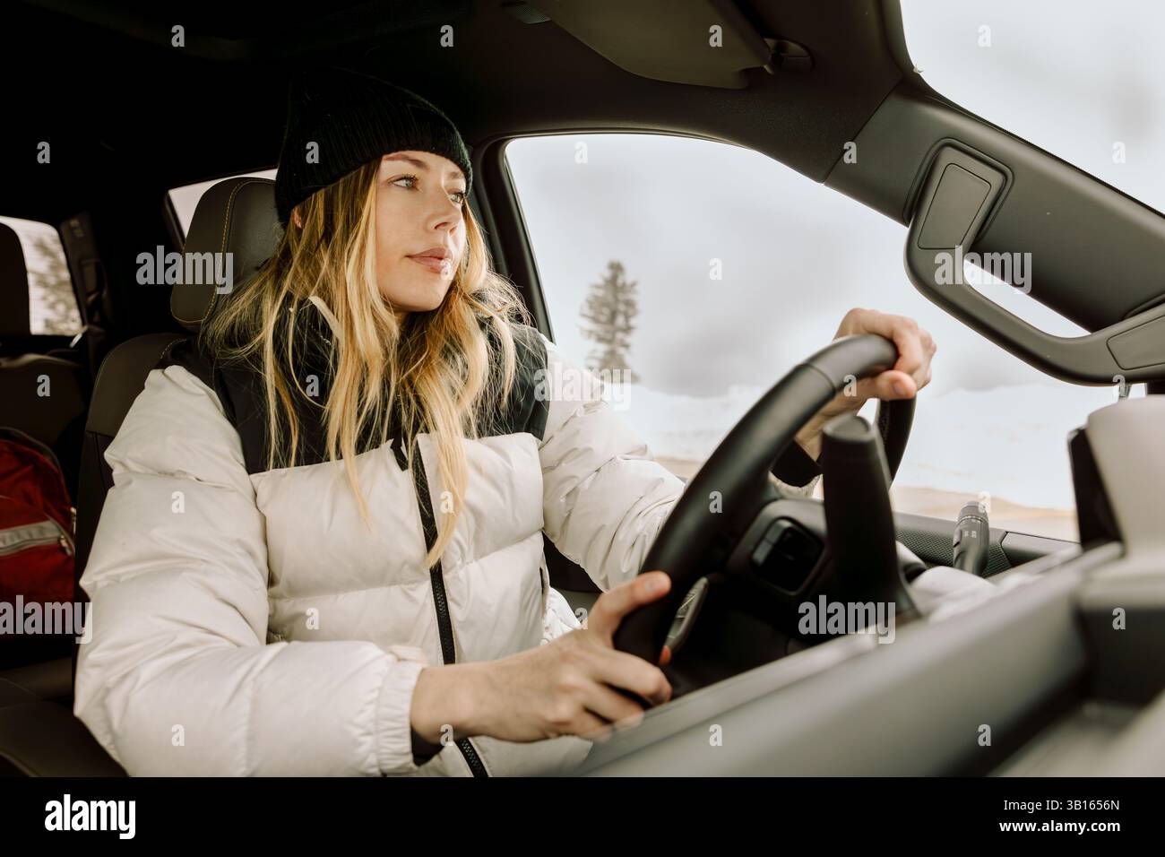 Focused woman driving through hi-res stock photography and images - Alamy