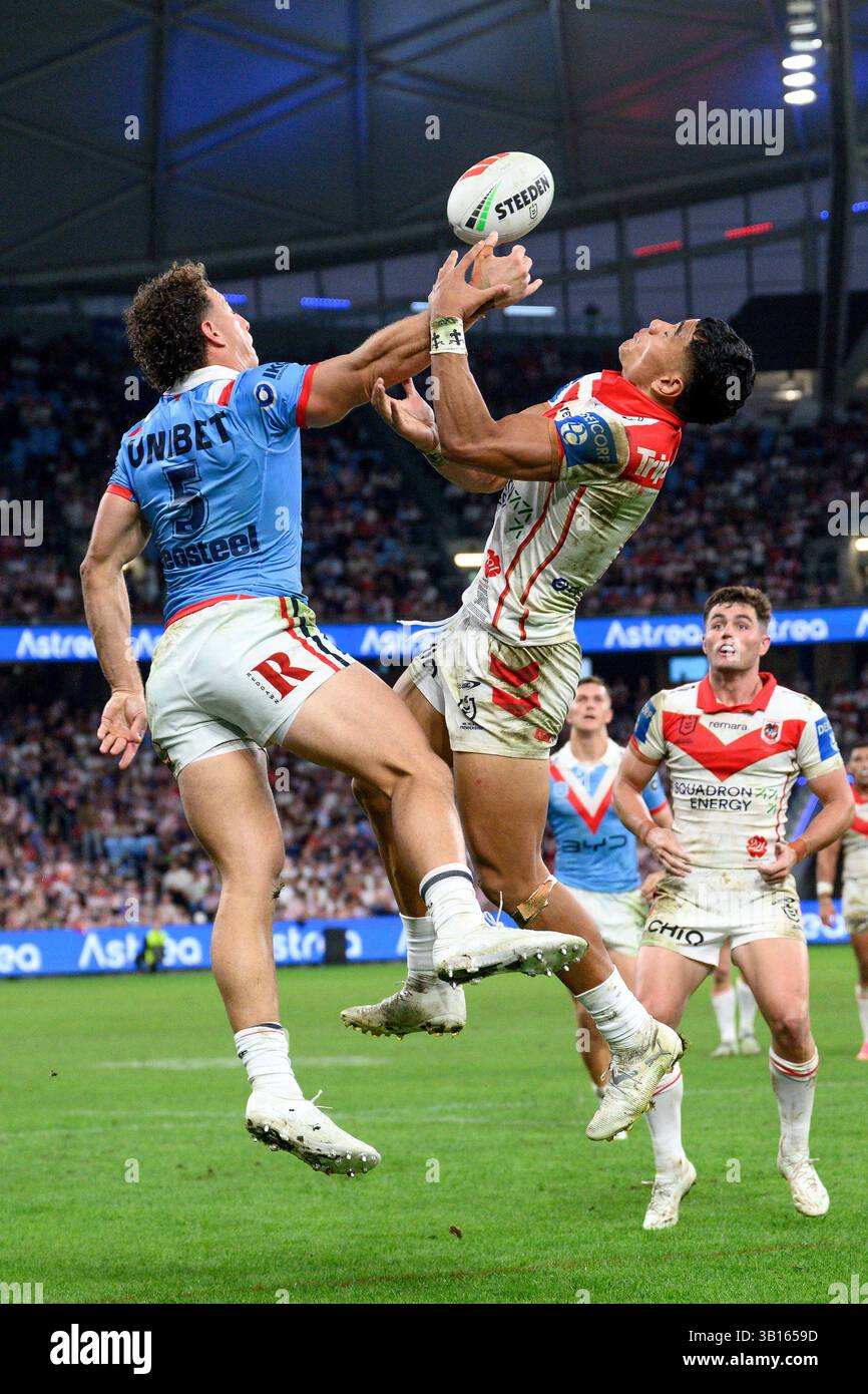 Sione Finau of the Dragons and Mark Nawaqanitawase of the Roosters ...