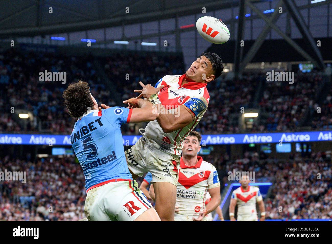 Sione Finau of the Dragons and Mark Nawaqanitawase of the Roosters ...