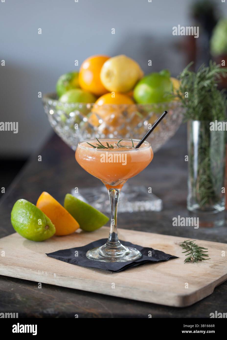 Cocktail with citrus fruit on bar counter Stock Photo - Alamy