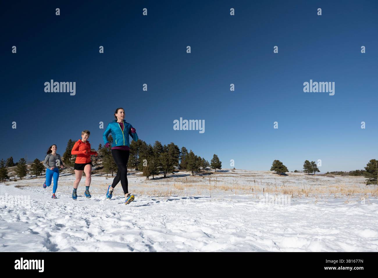 Ridge Running in Colorado with three women Stock Photo - Alamy