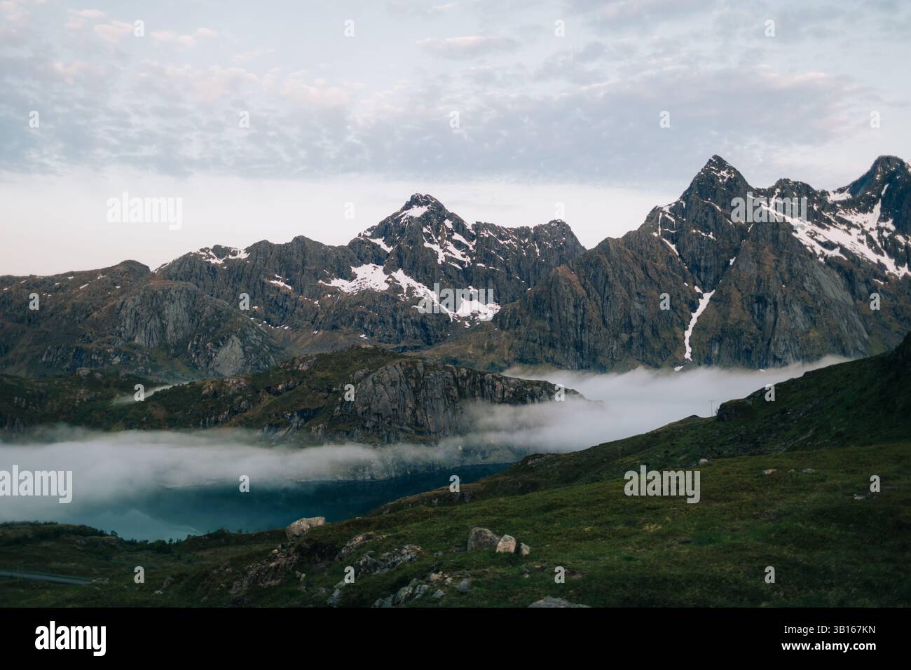 Dramatic mountain range in Lofoten at sunrise with coastal fog Stock ...