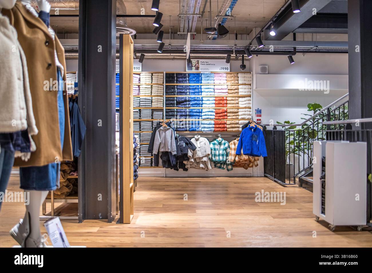 London, UK - September 14, 2023: Modern interior view of Uniqlo store ...