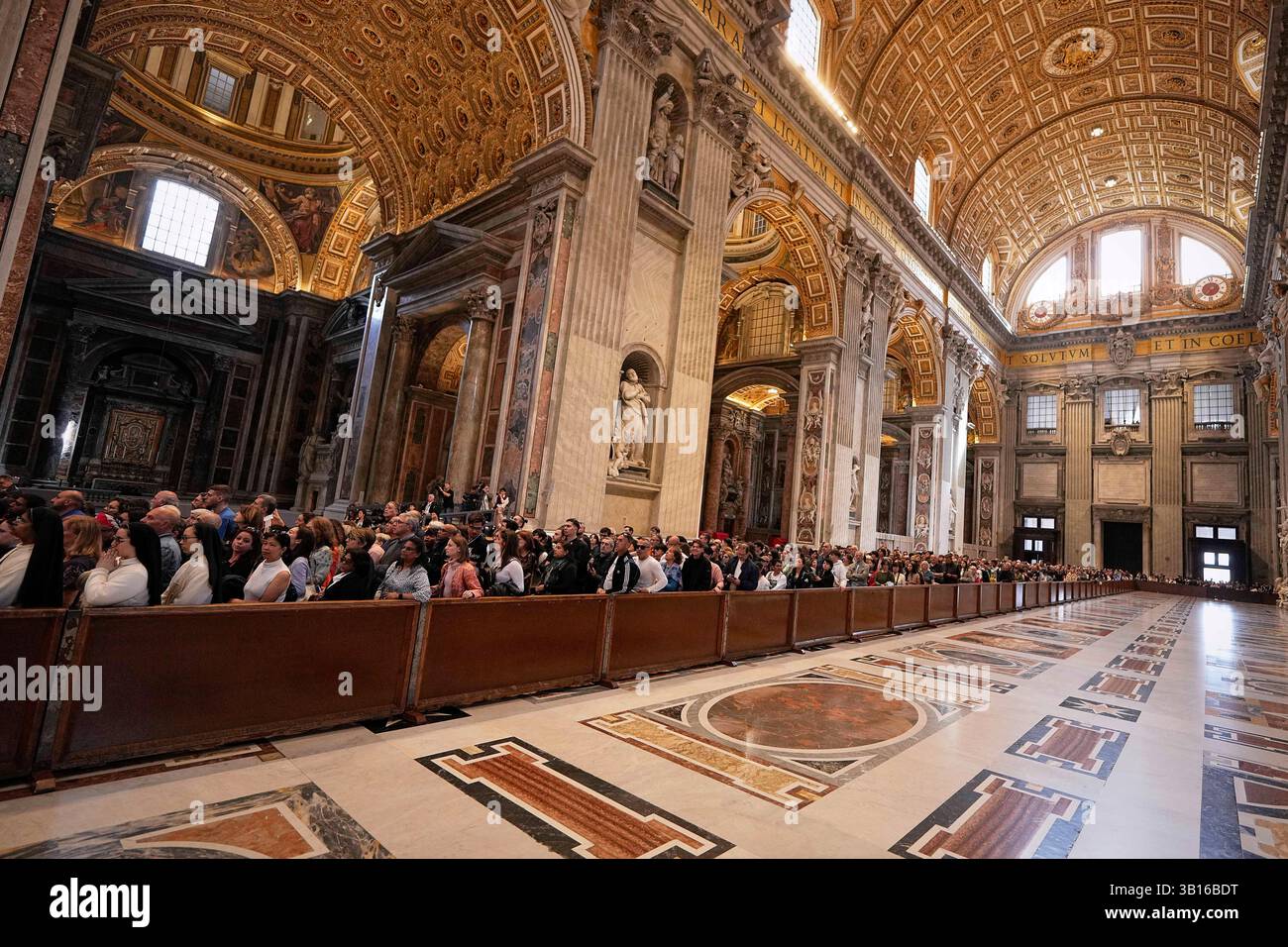 People wait in lines to pay their respects to the late Pope Francis ...