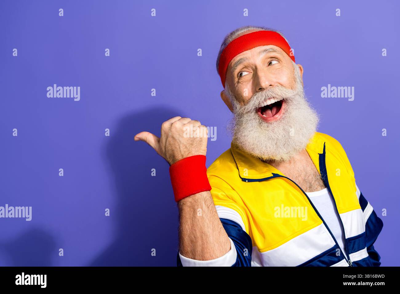 Senior man wearing retro activewear smiling joyfully posing against ...