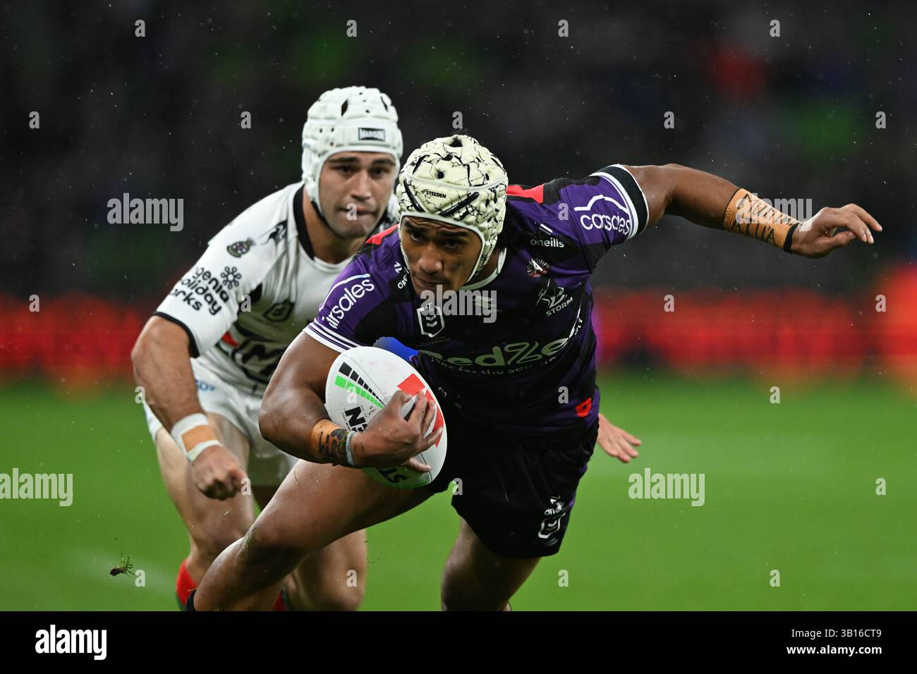 Sualauvi Faalogo of the Storm (right) is tackled by Jye Gray of the ...