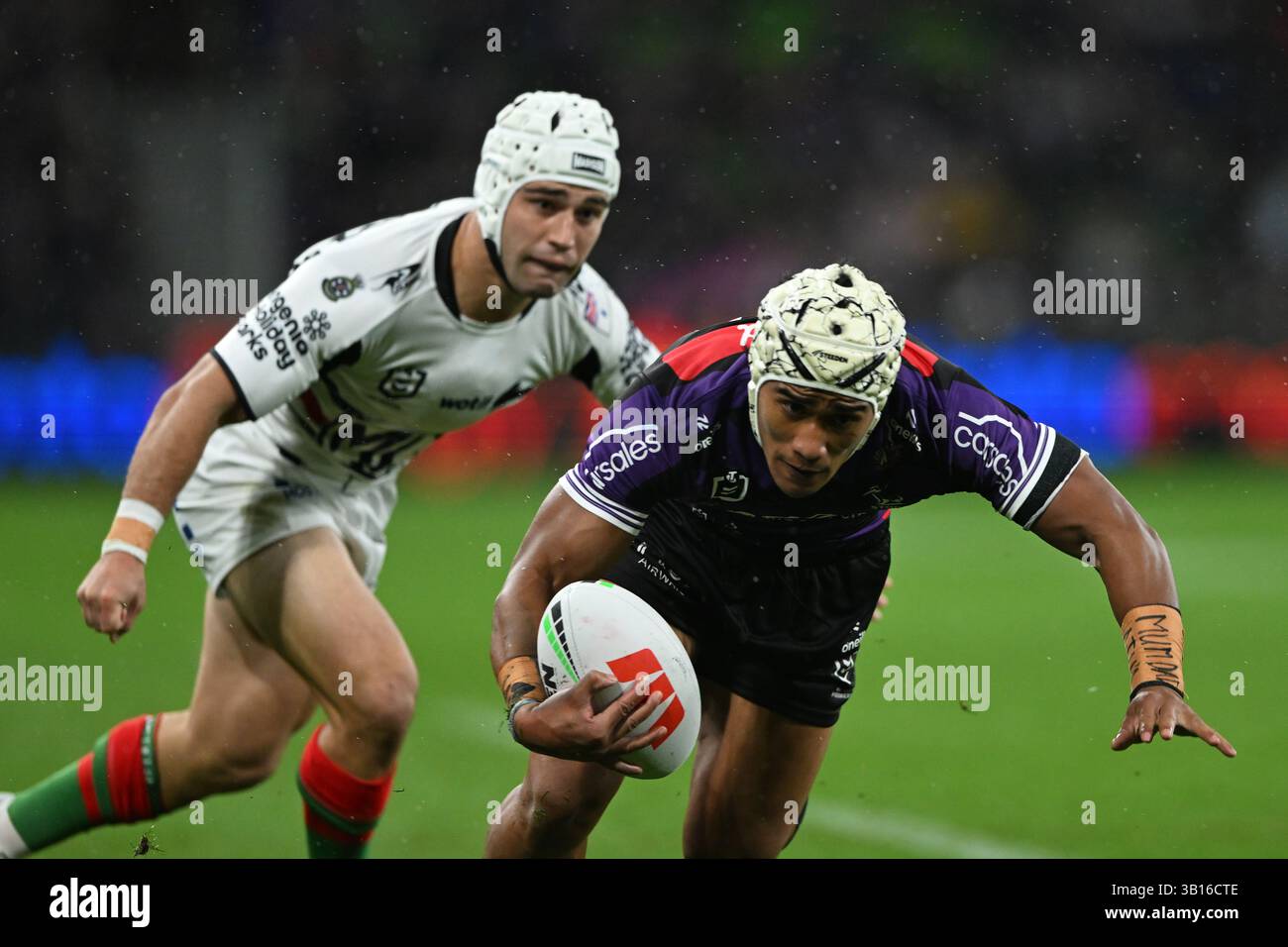 Sualauvi Faalogo of the Storm (right) is tackled by Jye Gray of the ...