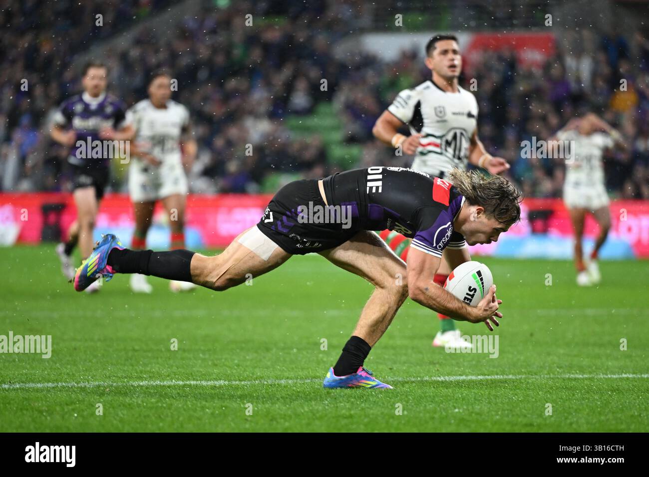 Ryan Papenhuyzen of the Storm scores a try during the NRL Round 8 match between the Melbourne ...