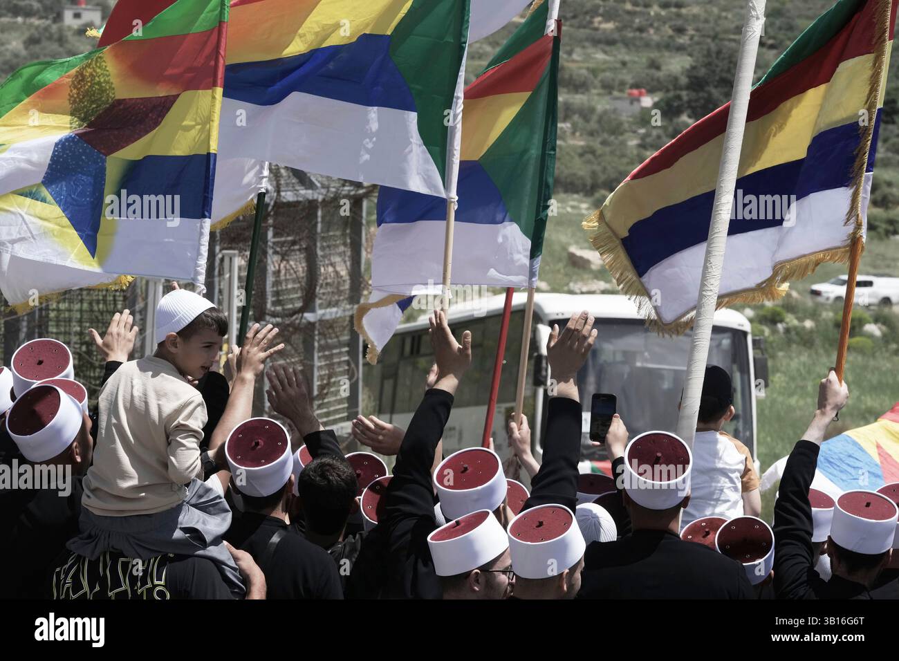 Travelling in buses, Syrian Druze clerics are welcomed by members of ...