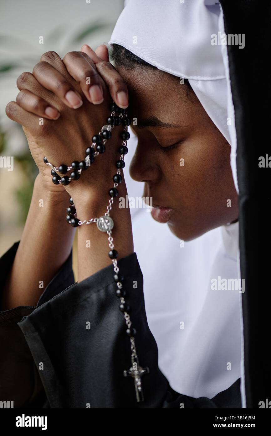 Vertical shot catholic nun in hi-res stock photography and images - Alamy