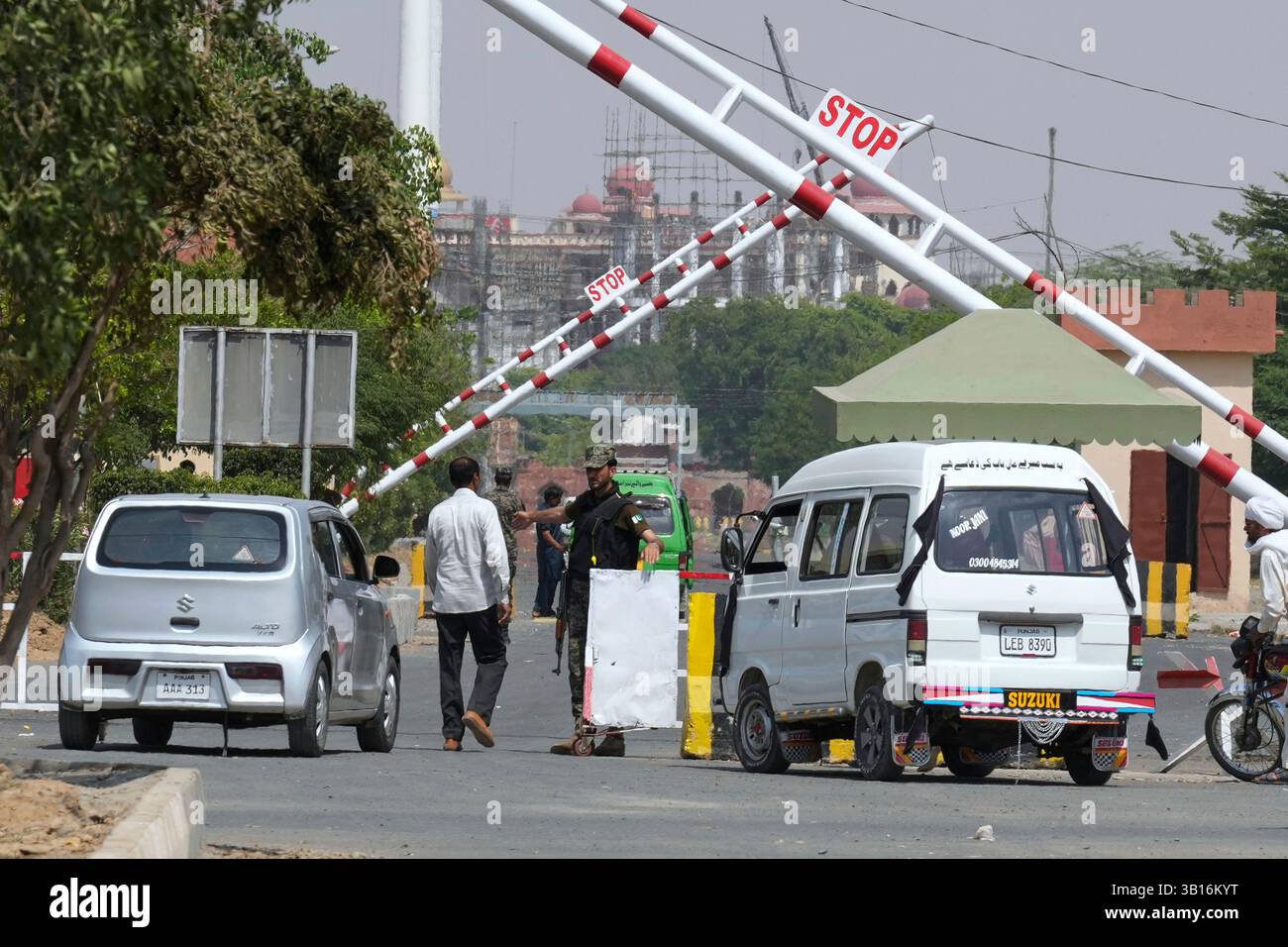 Pakistani paramilitary soldiers stand guard at a checkpoint in Wagah, a ...