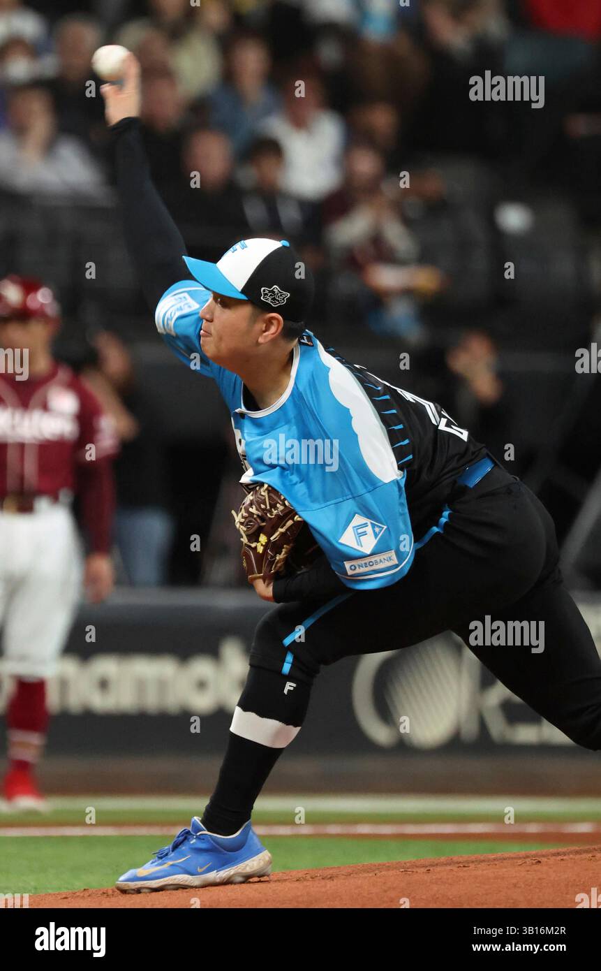 GU LIN RUEI-YANG of Hokkaido Nippon-Ham Fighters throws a ball as a ...