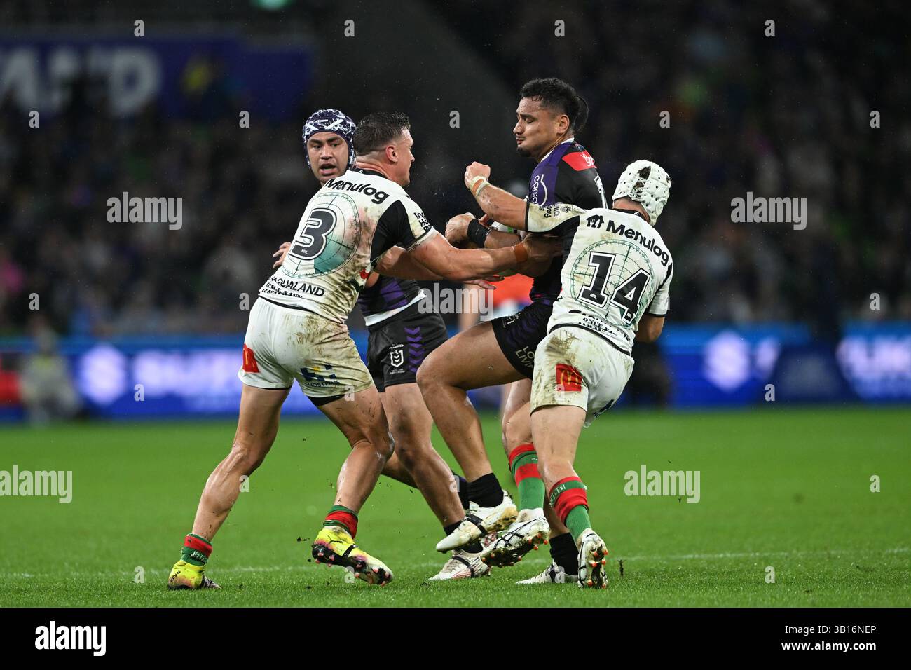 Eliesa Katoa of the Storm (2nd right) is tackled by Jye Gray of the ...