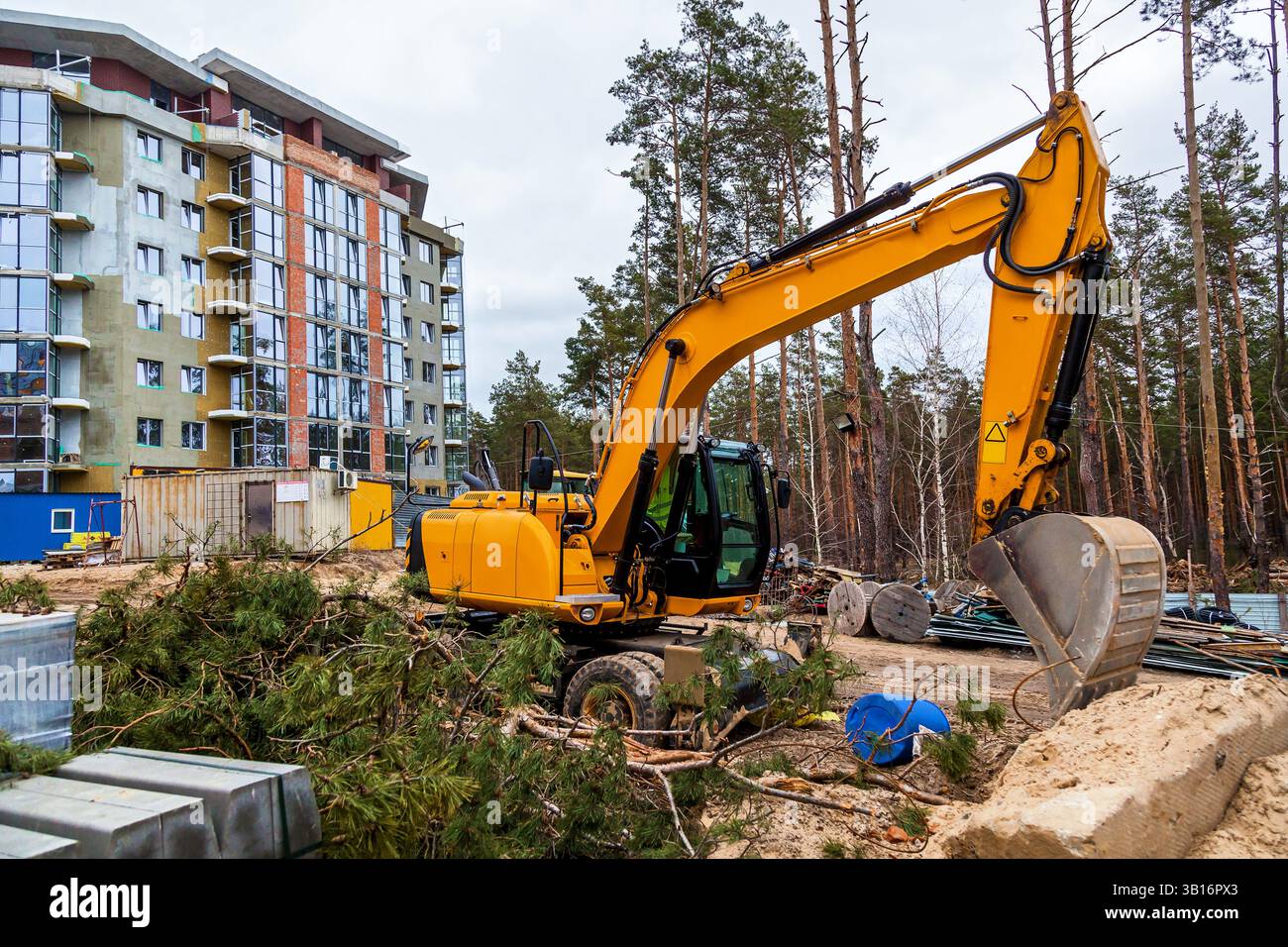 Modern hydraulic excavator under hi-res stock photography and images ...