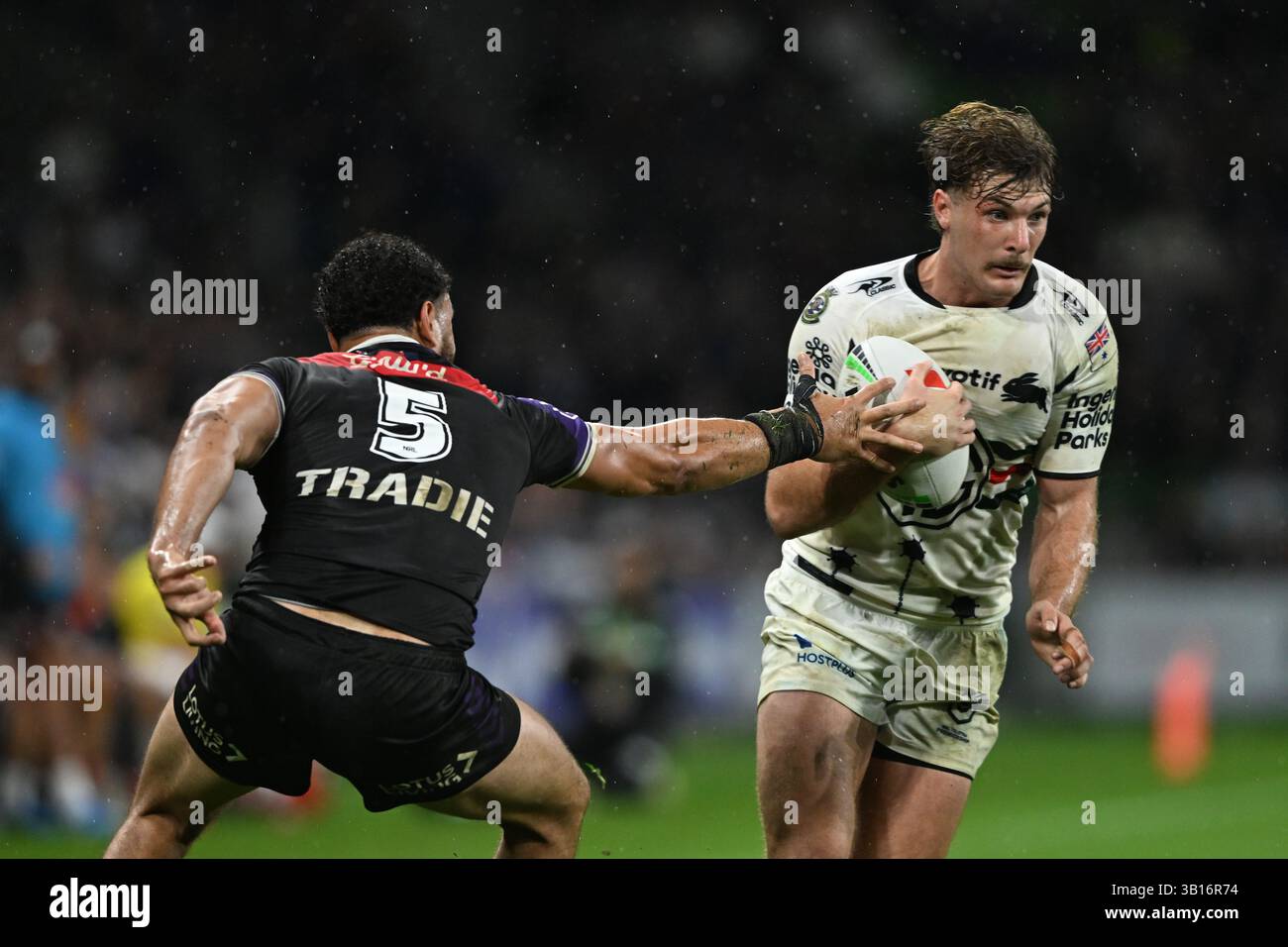 Campbell Graham of the Rabbitohs (right) in action while being tackled ...