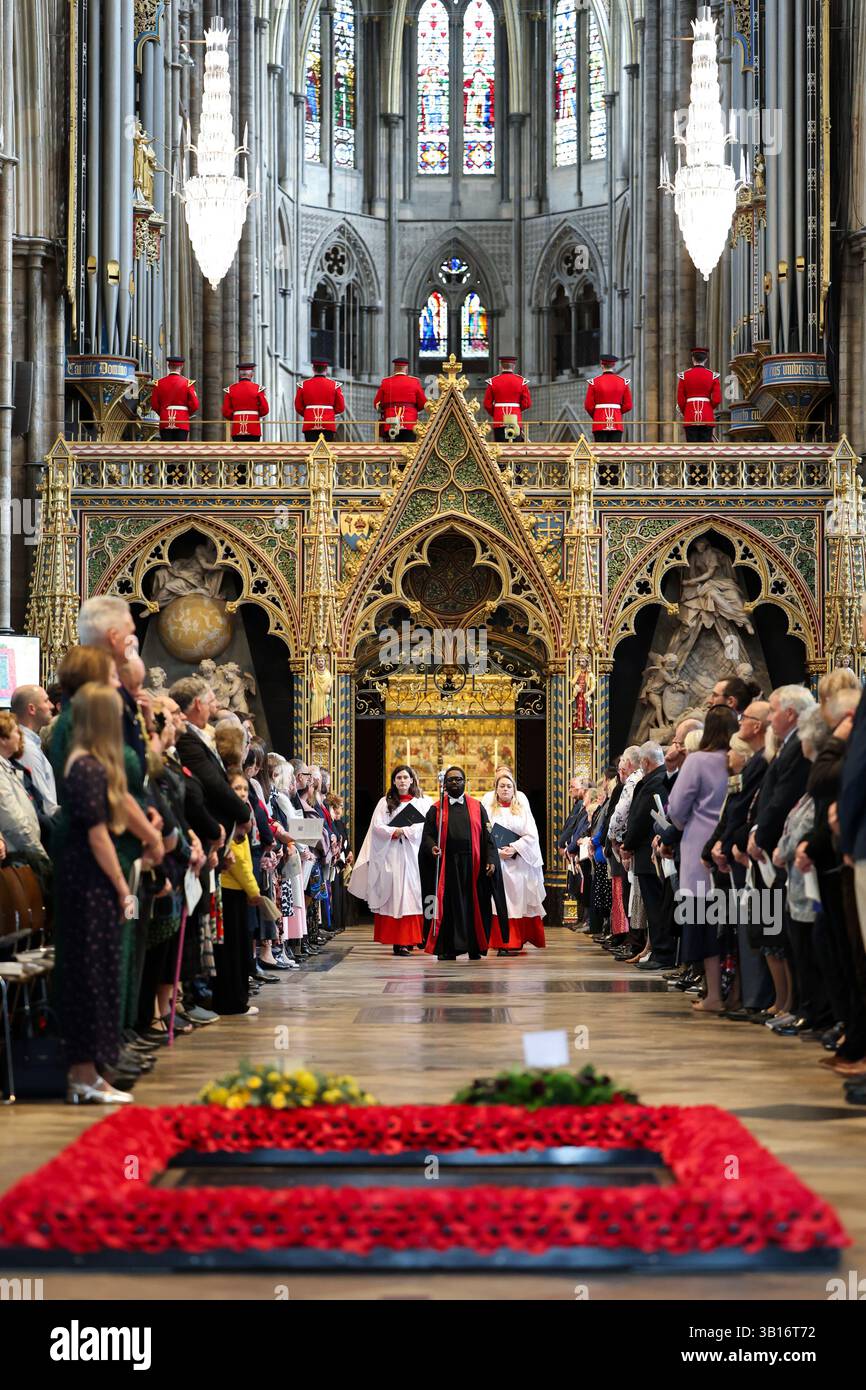 The choir departs a service of commemoration and thanksgiving ...