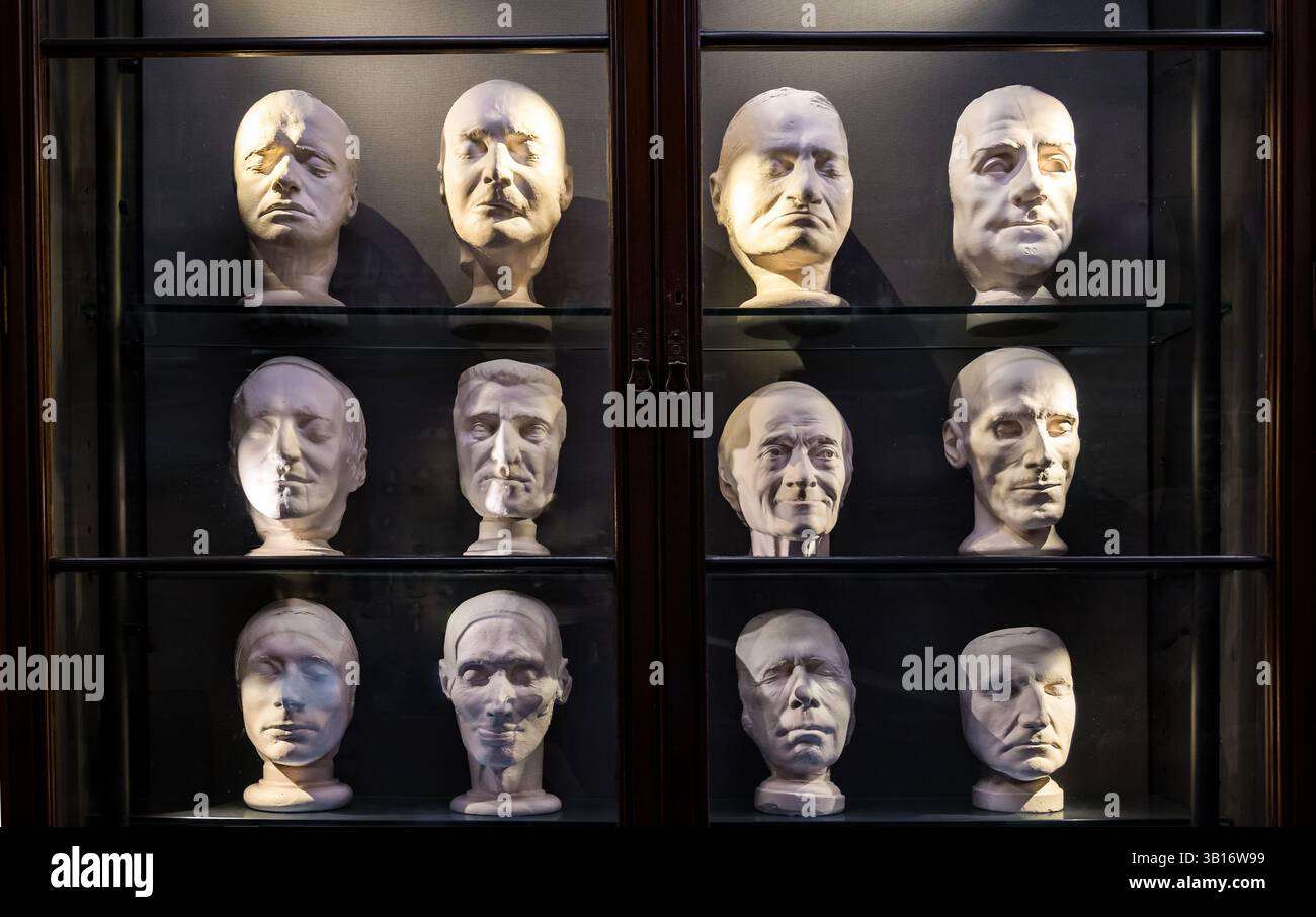 Display cabinet with 19th century death plaster cast masks made for ...