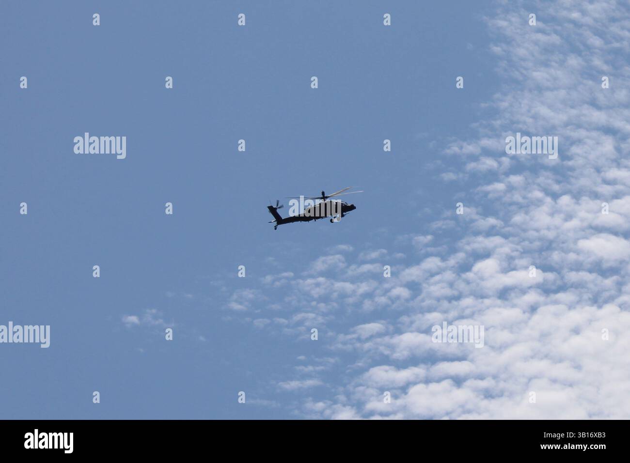 Apache flying over the USS Yorktown Stock Photo - Alamy