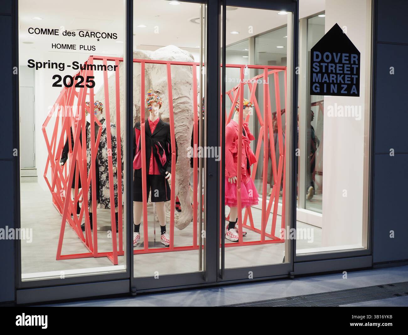 TOKYO, JAPAN - April 7, 2025: A Comme des Garcons display in the window ...
