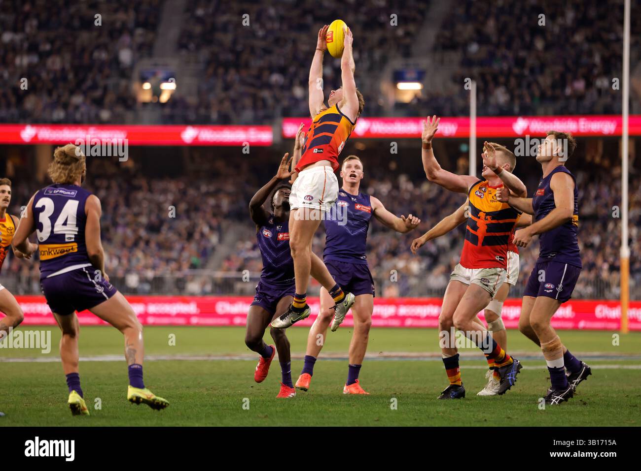 Perth, Australia. 25th Apr, 2025. Max Michalanney of the Crows marks ...