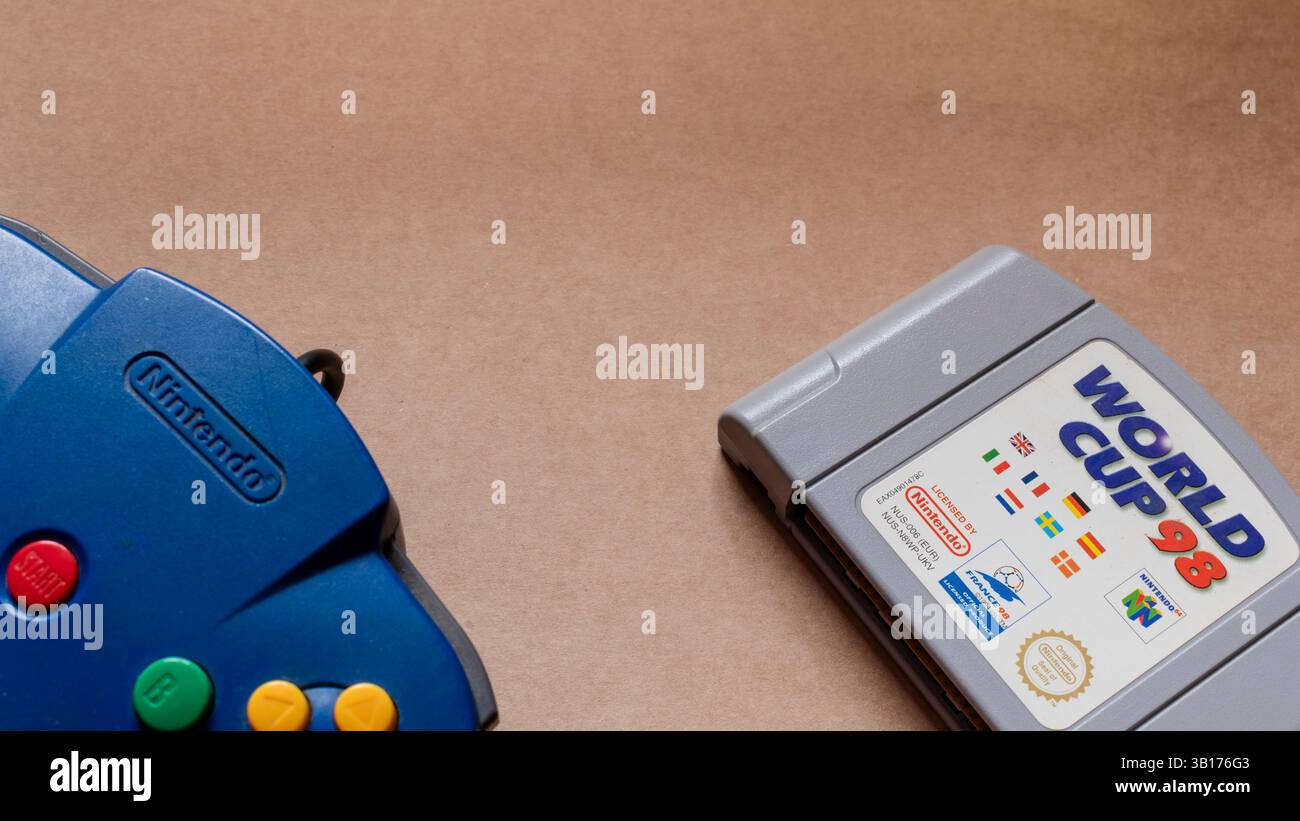 Nintendo console with World Cup 98 catridge isolated on bright ...