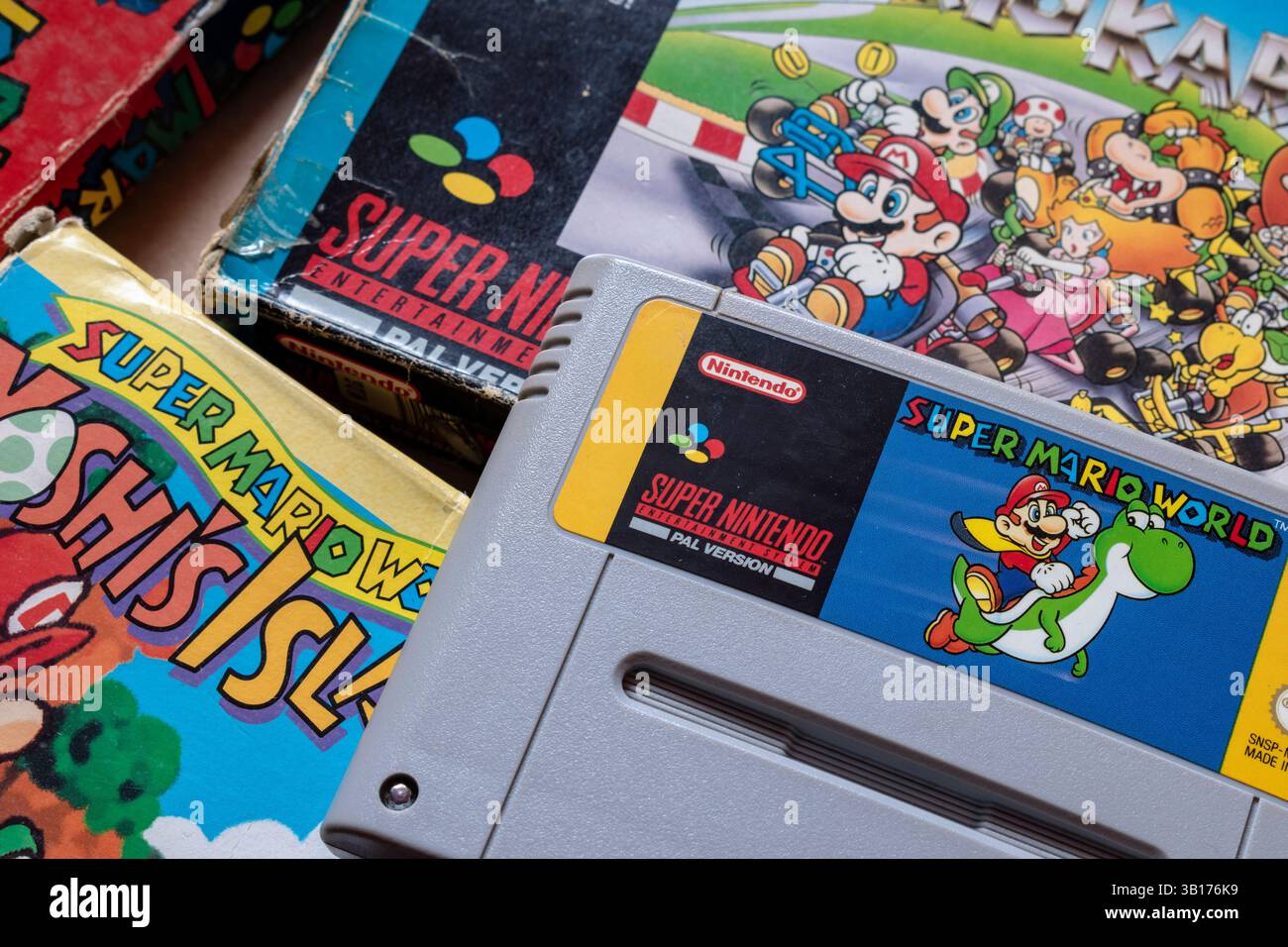 Super Mario World Nintendo cartridges with game boxes Stock Photo - Alamy