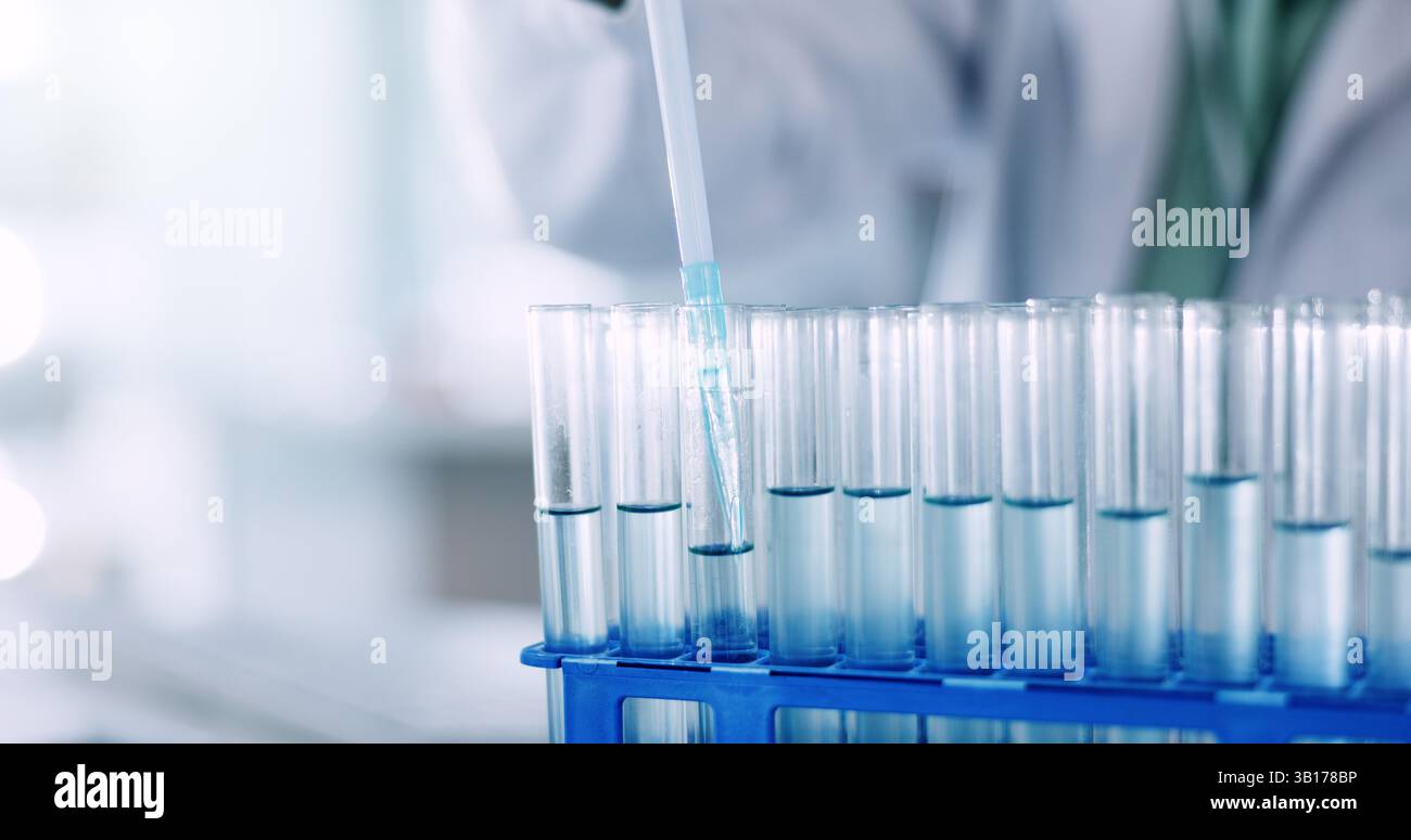 Science, liquid and test tubes with chemical in laboratory for ...