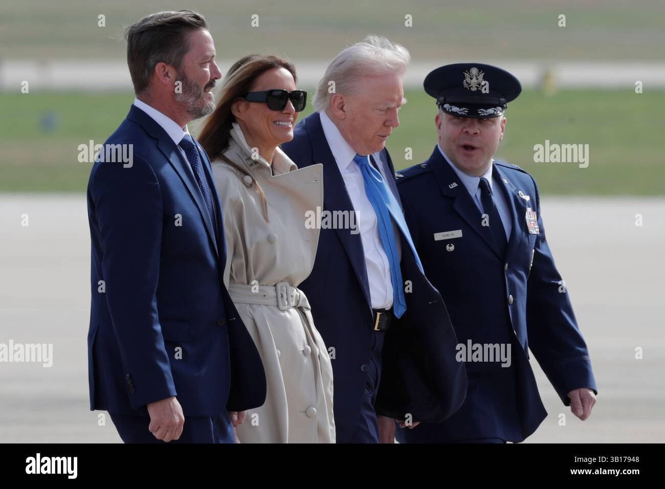 President Donald Trump, second from right, is escorted by Col. Paul ...