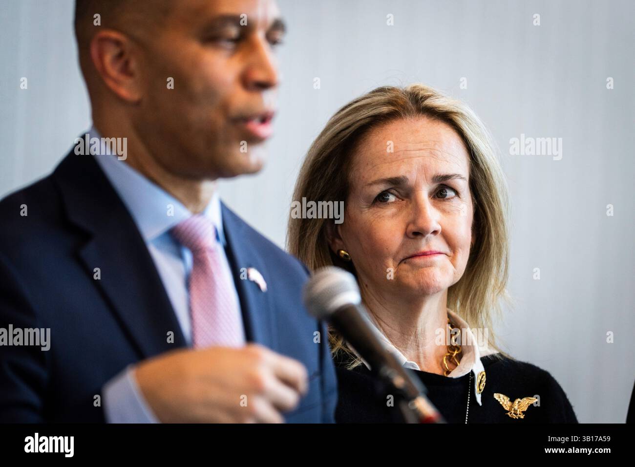 Rep. Madeleine Dean, right, looks on at a press conference during the ...